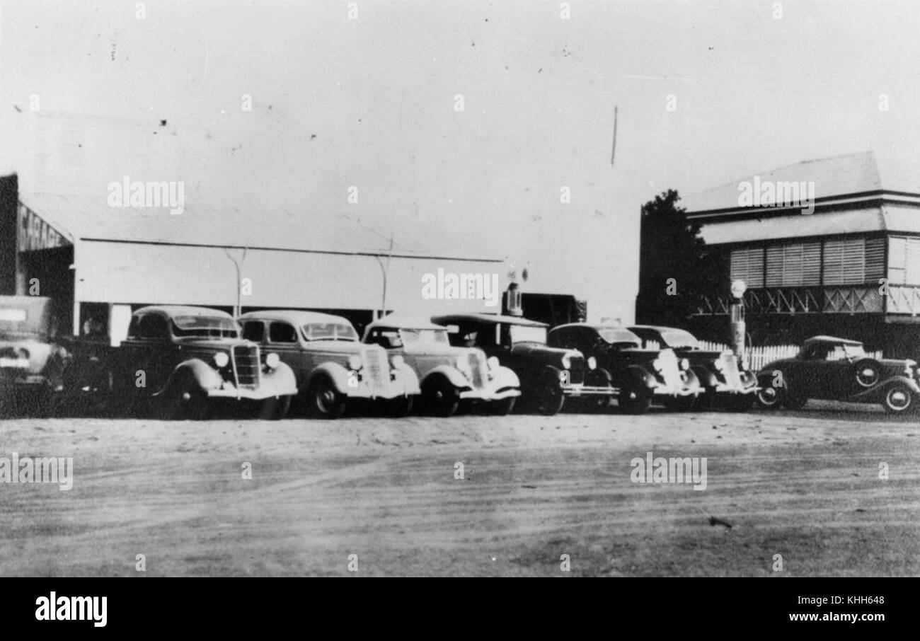 Classic car in garage Black and White Stock Photos & Images - Alamy