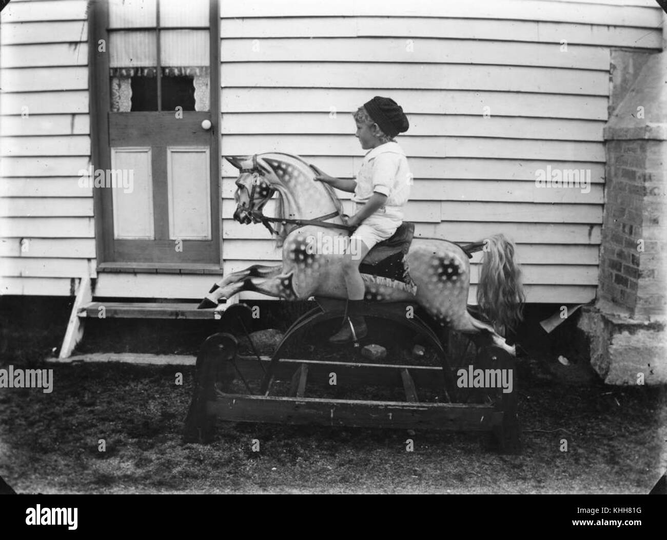 Riding rocking horse Black and White Stock Photos & Images - Alamy