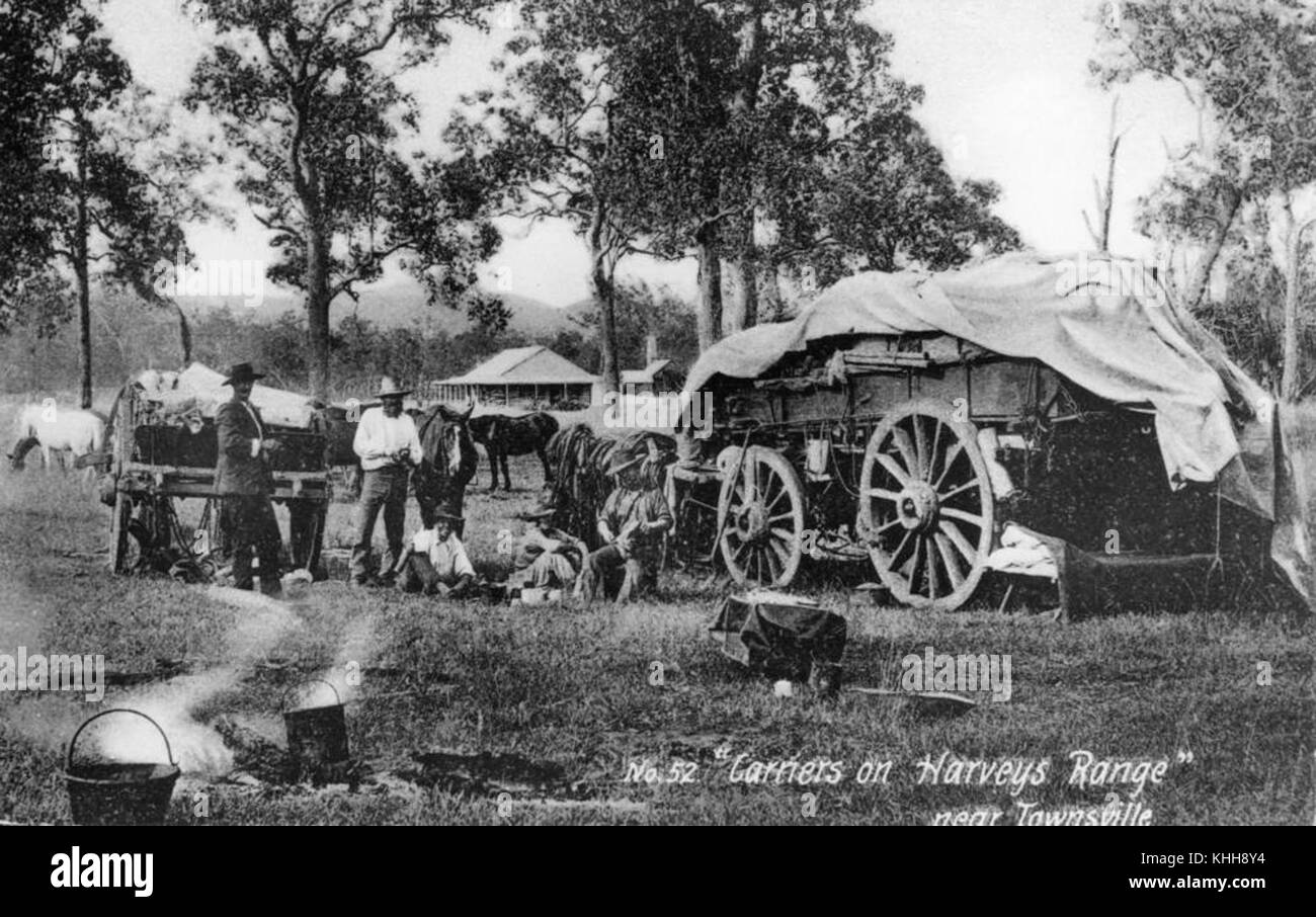 This photograph captures a historical scene from the early 1900s ...