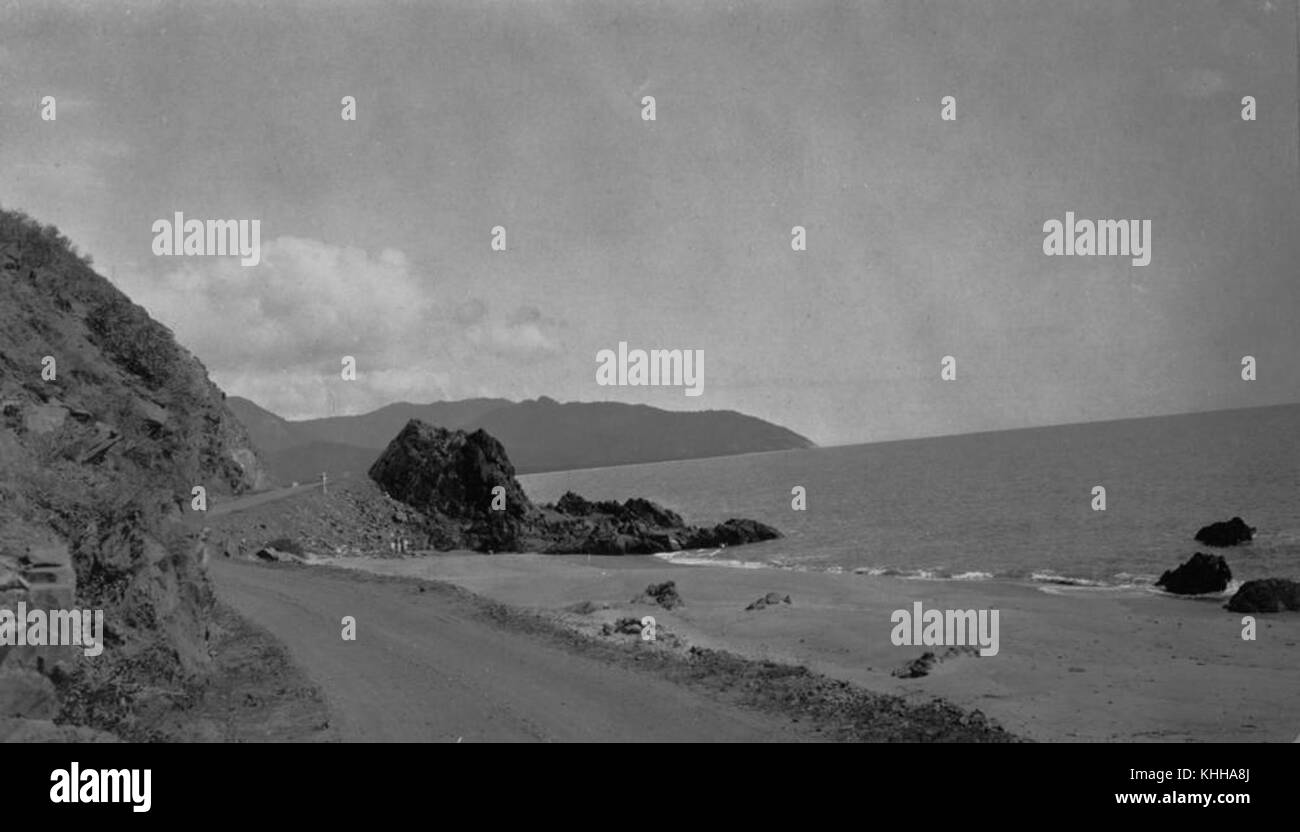 A historical photograph of the Cook Highway, unsealed, between Cairns ...