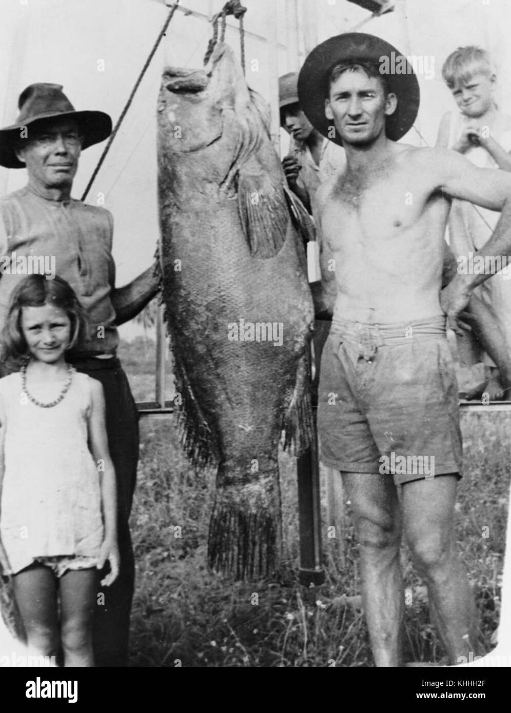 A photograph documenting the capture of a Groper fish in the Haghton ...