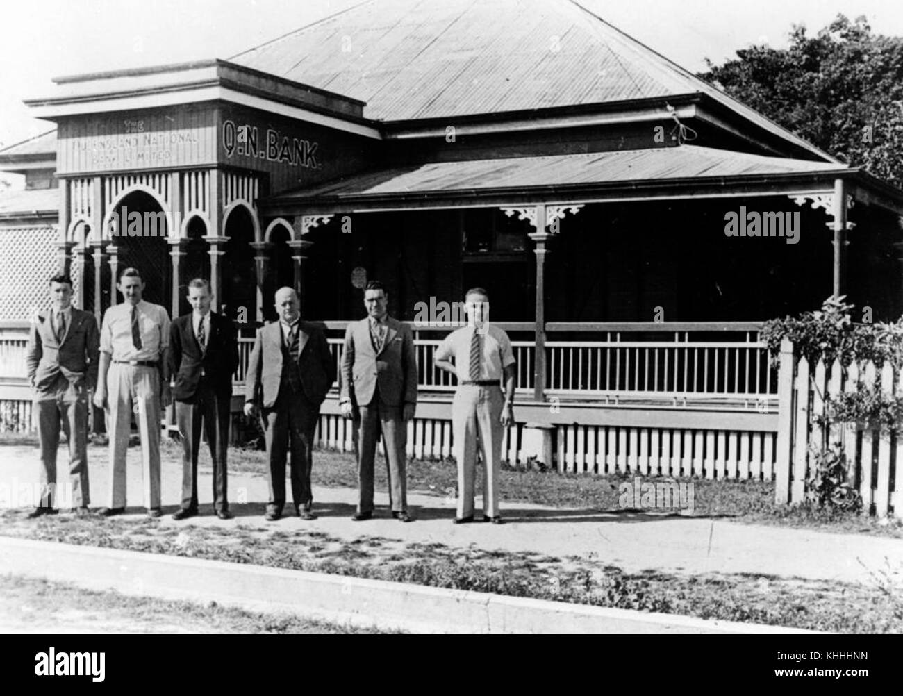 1 90812 Bank staff in front of the Ingham branch of the Queensland ...