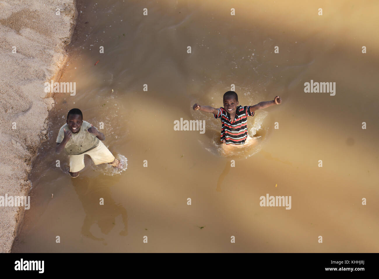 BRICHENOUGH BRIDGE, ZIMBABWE - 15 October 2011. Two boys seen on the ...