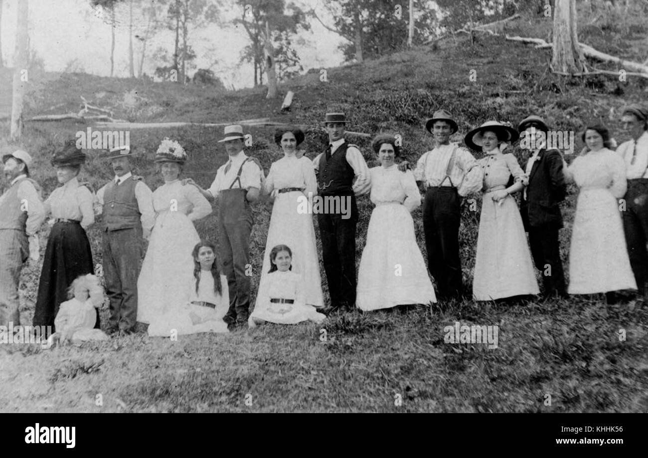 A photograph from 1911 showing a group of well-dressed men and women ...