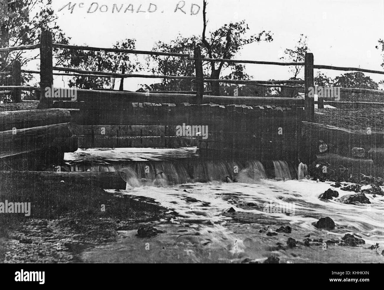 This historic photograph shows the bridge and weir located at McDonald ...