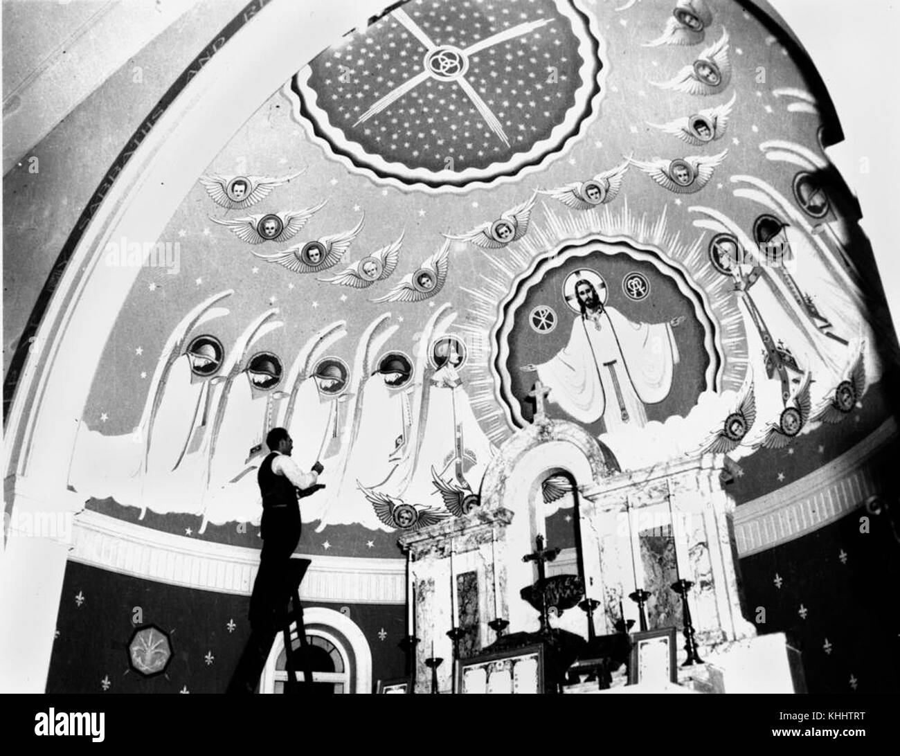 2 178319 Artist James Wieneke putting the finishing touches to a mural ...
