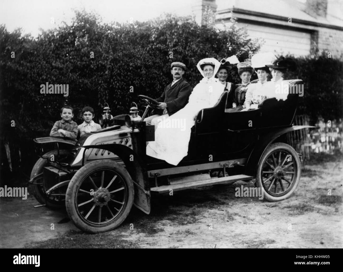 1 195087 William L'Estrange and his family enjoying an outing in their ...