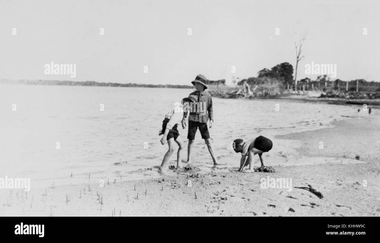 2 165135 Children digging in the sand on a beach, 1910-1920 Stock Photo ...