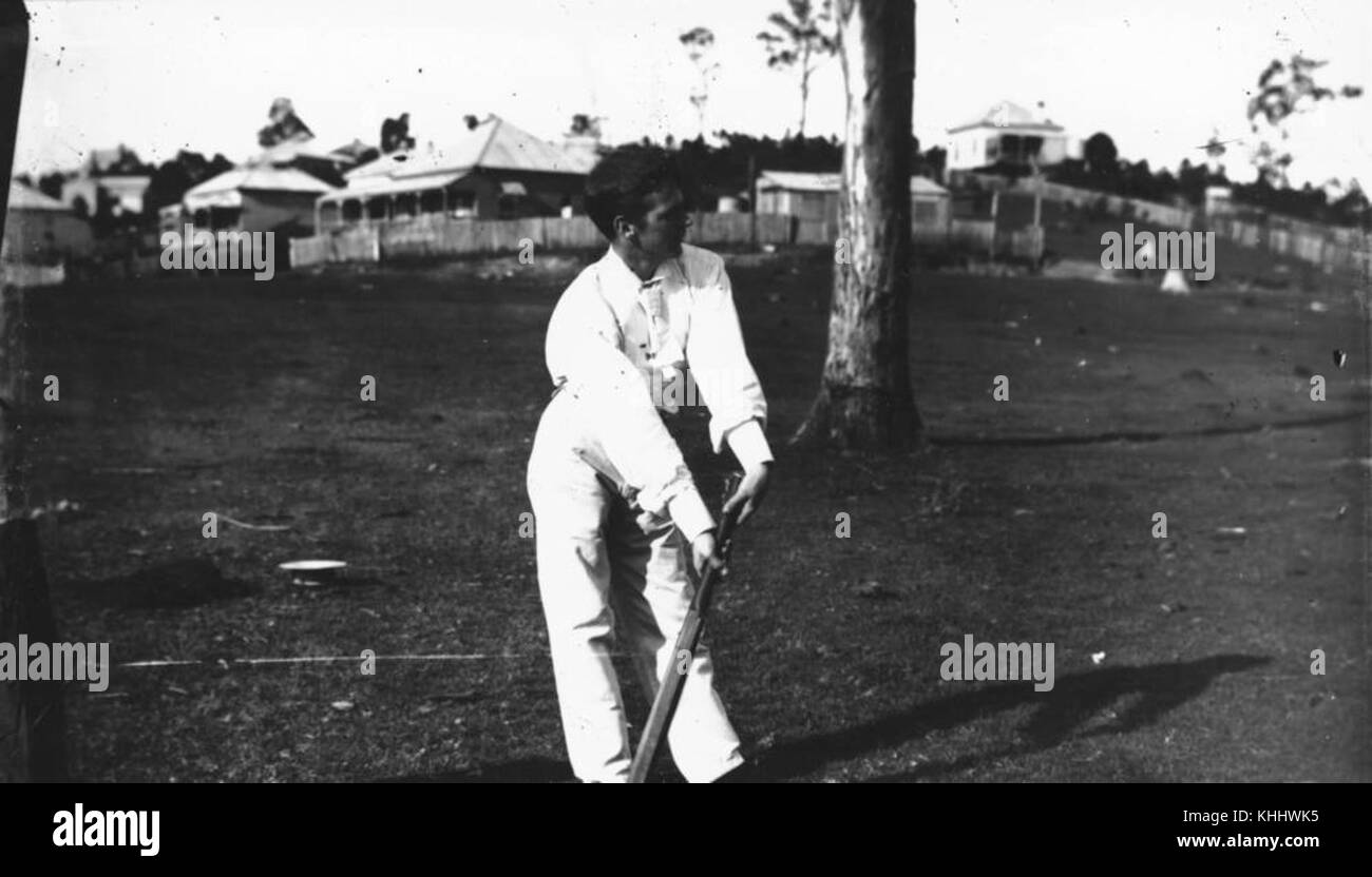 This photograph captures a cricket match in Norman Park, Brisbane ...