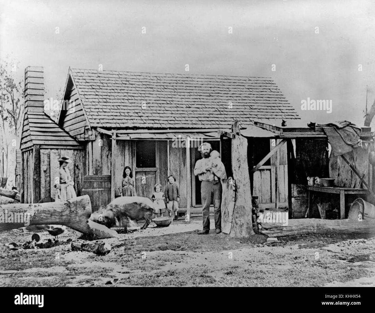 1 86552 Family and farmhouse, ca. 1870 Stock Photo - Alamy
