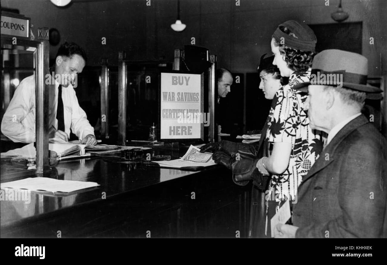 1 185383 Customers line up at the counter of the Commonwealth Bank ...