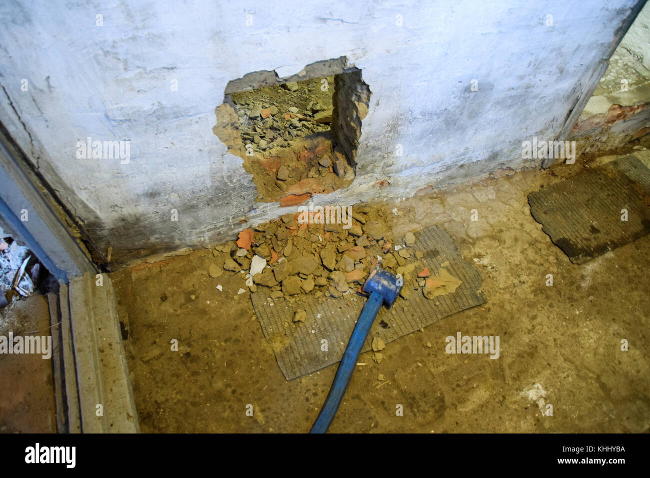 The punched wall. The opening which is beaten out in a wall Stock Photo ...