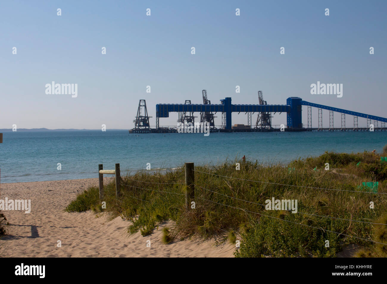Grain storage facilities and long jetty with mechanised conveyor belt ...