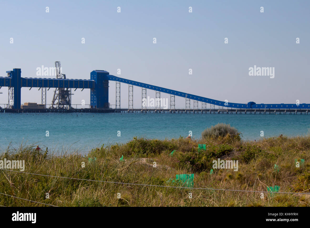 Grain storage facilities and long jetty with mechanised conveyor belt ...