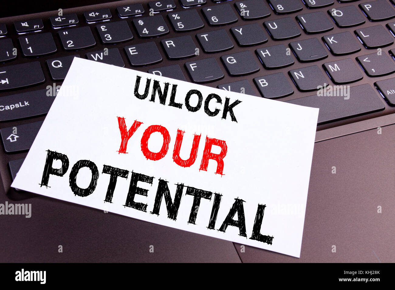 Writing text showing Unlock Your Potential made in the office with ...