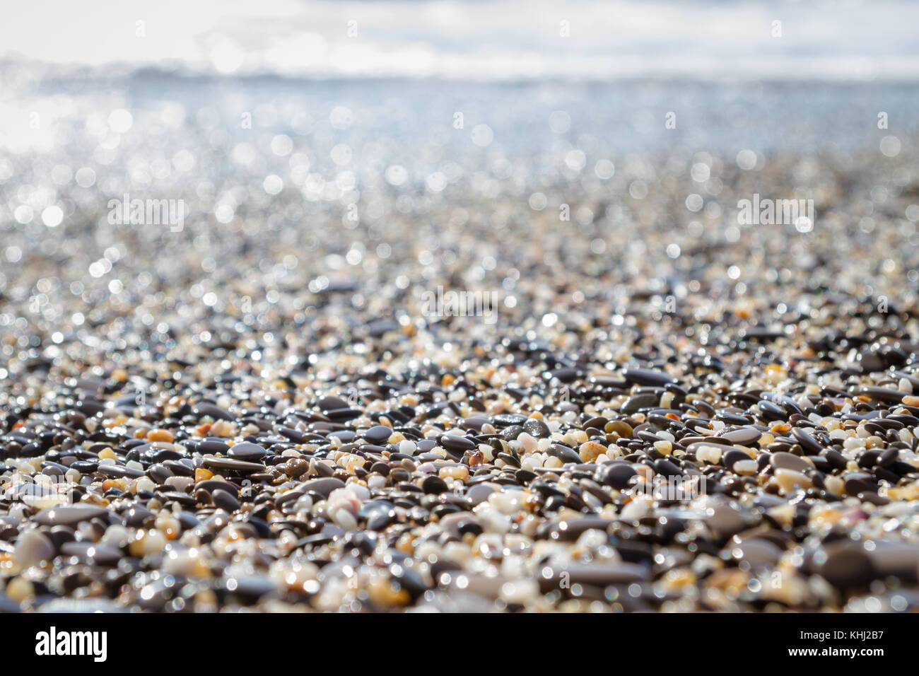 Sea stones on the seashore in the summer Stock Photo - Alamy