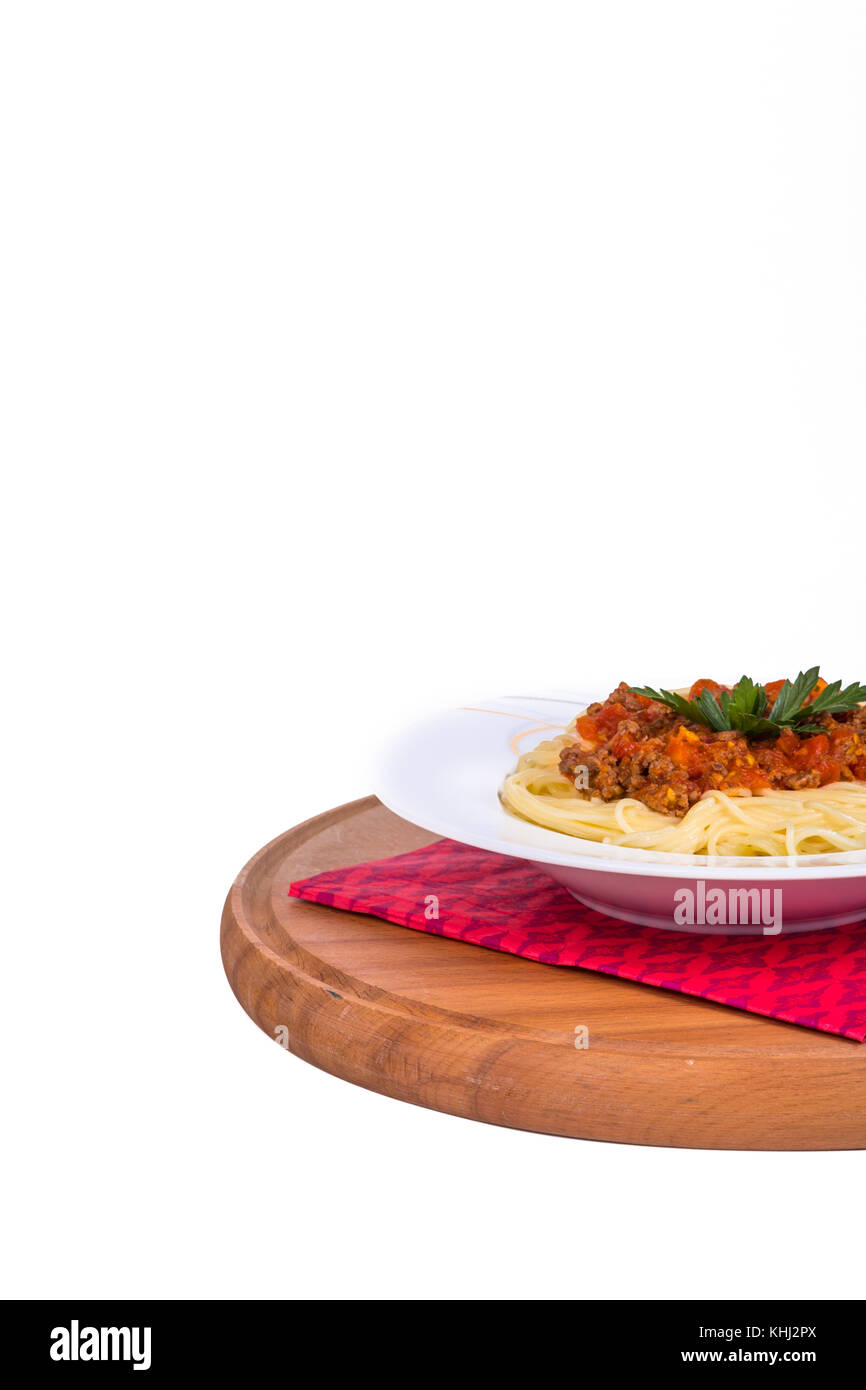 Side view of plate of spaghetti pasta with tomato bolognese sauce ...