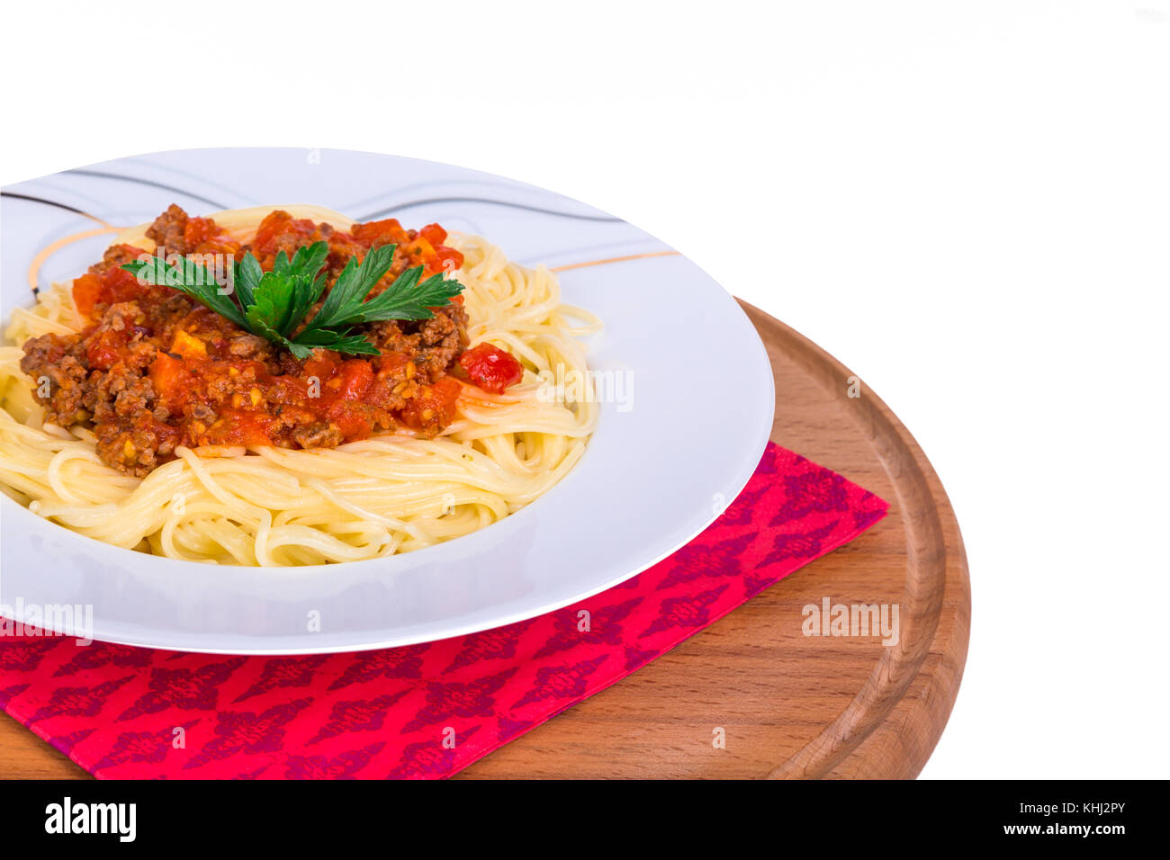 Side view of plate of spaghetti pasta with tomato bolognese sauce ...