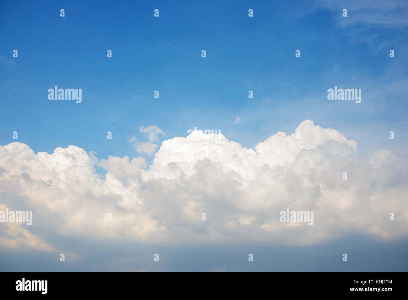 Background of the clear blue cerulean sky with big fluffy white cloud ...