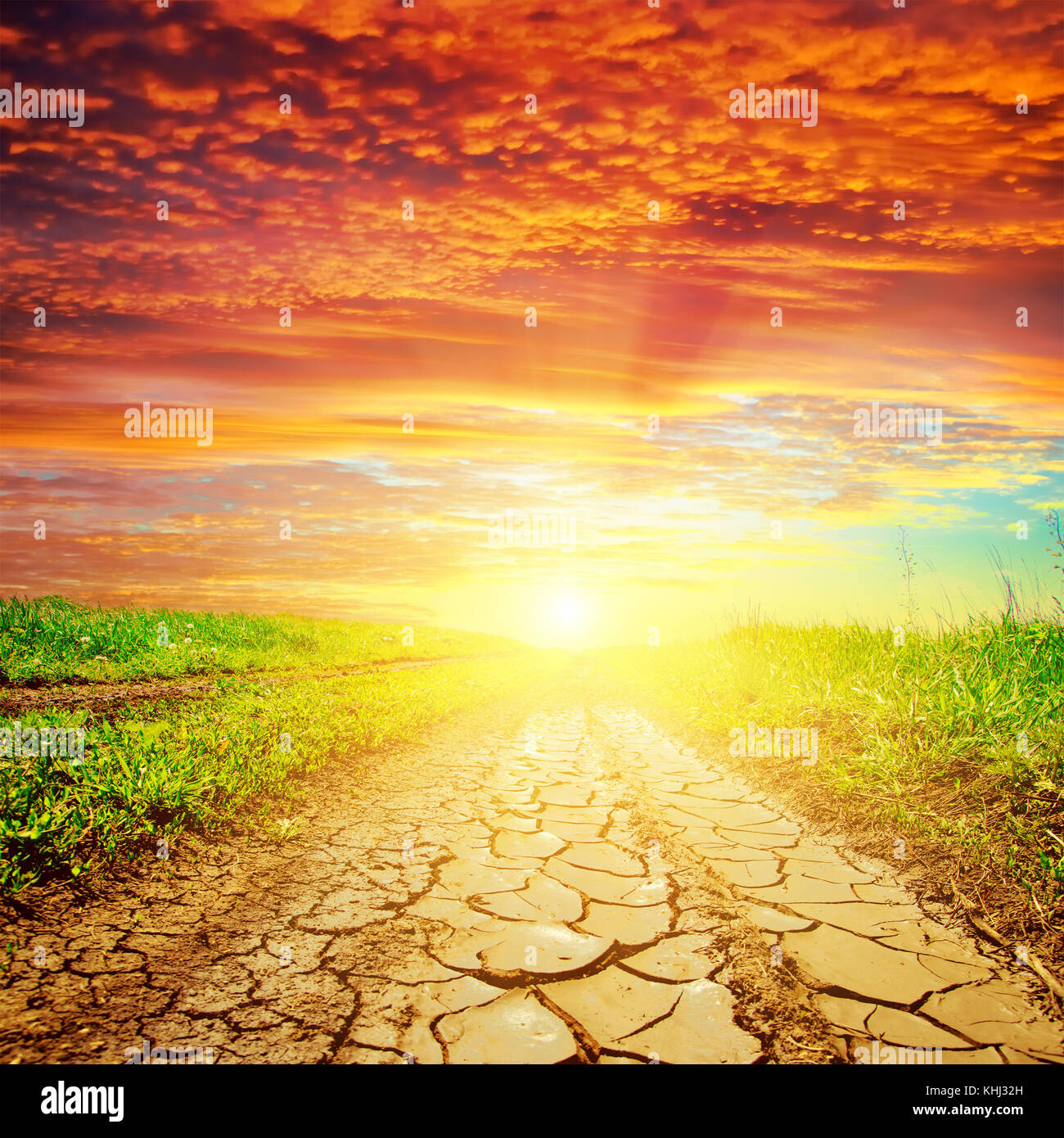 red sunset over drought road Stock Photo - Alamy
