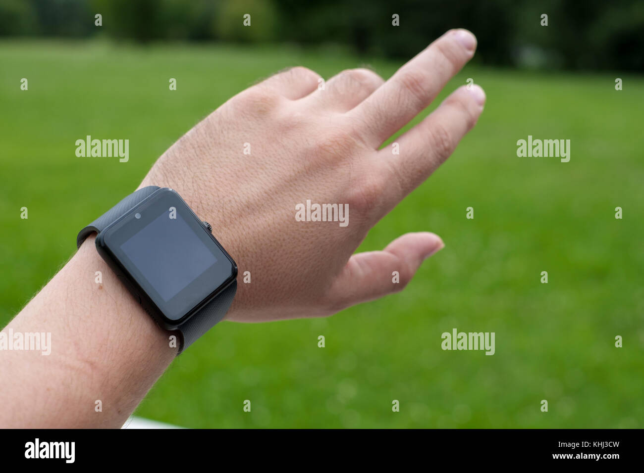 Man using smart watch Stock Photo - Alamy