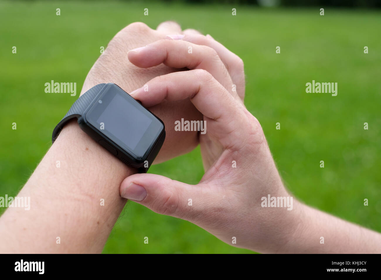 Man using smart watch Stock Photo - Alamy