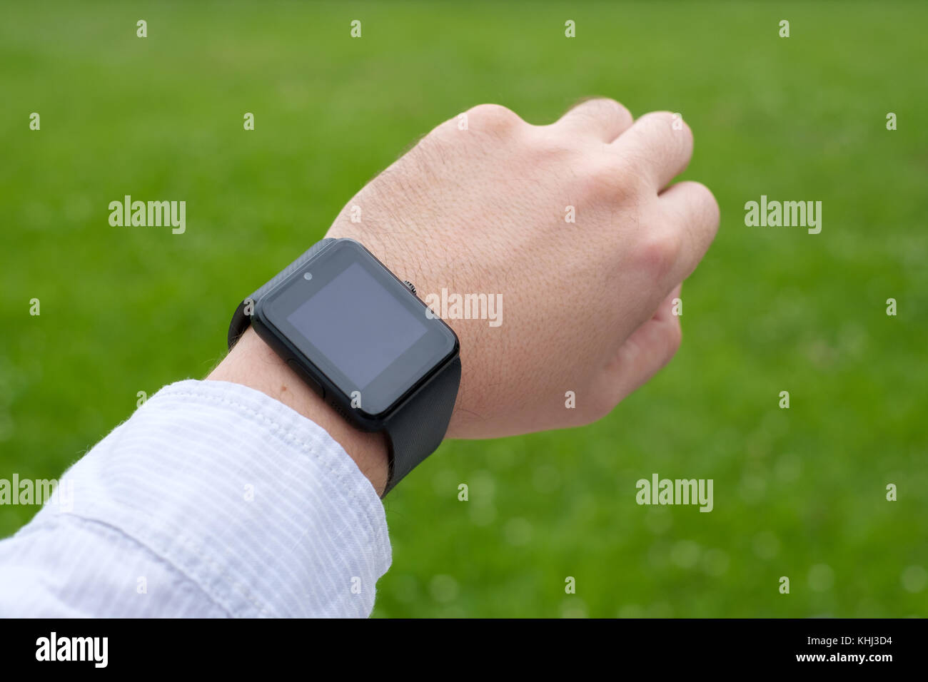 Man using smart watch Stock Photo - Alamy