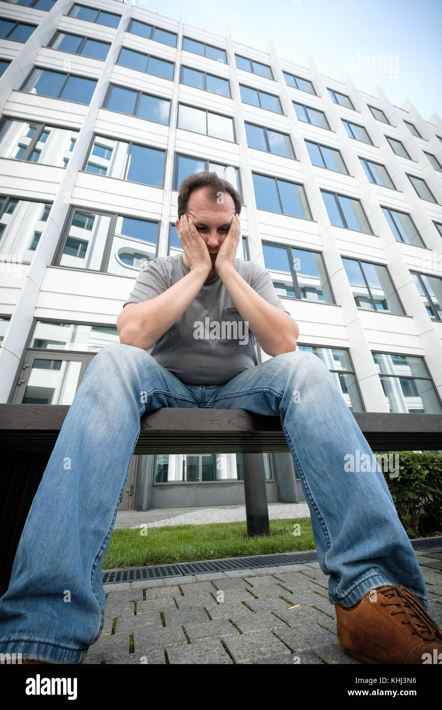 Sad middle age man portrait Stock Photo - Alamy