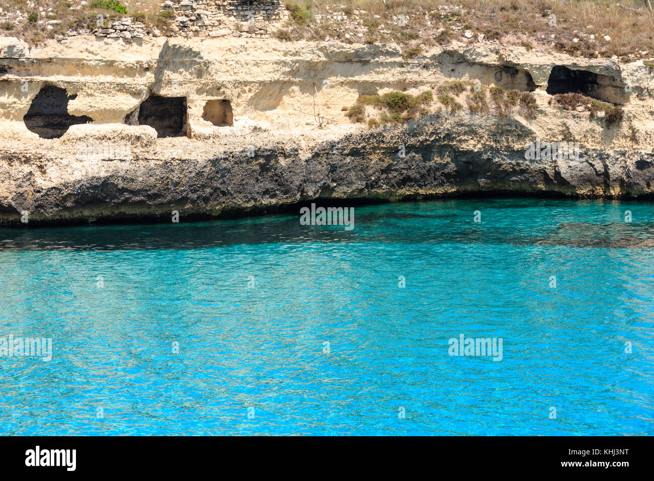 Ancient small caves on picturesque Adriatic sea coast Archaeological ...