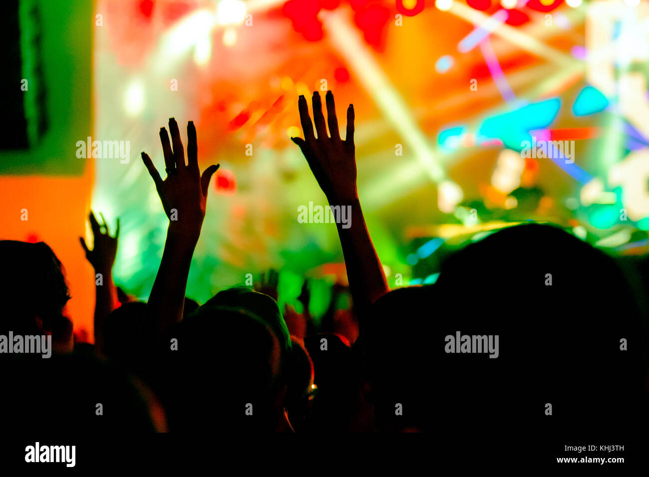 Fans cheering at open-air live concert Stock Photo - Alamy