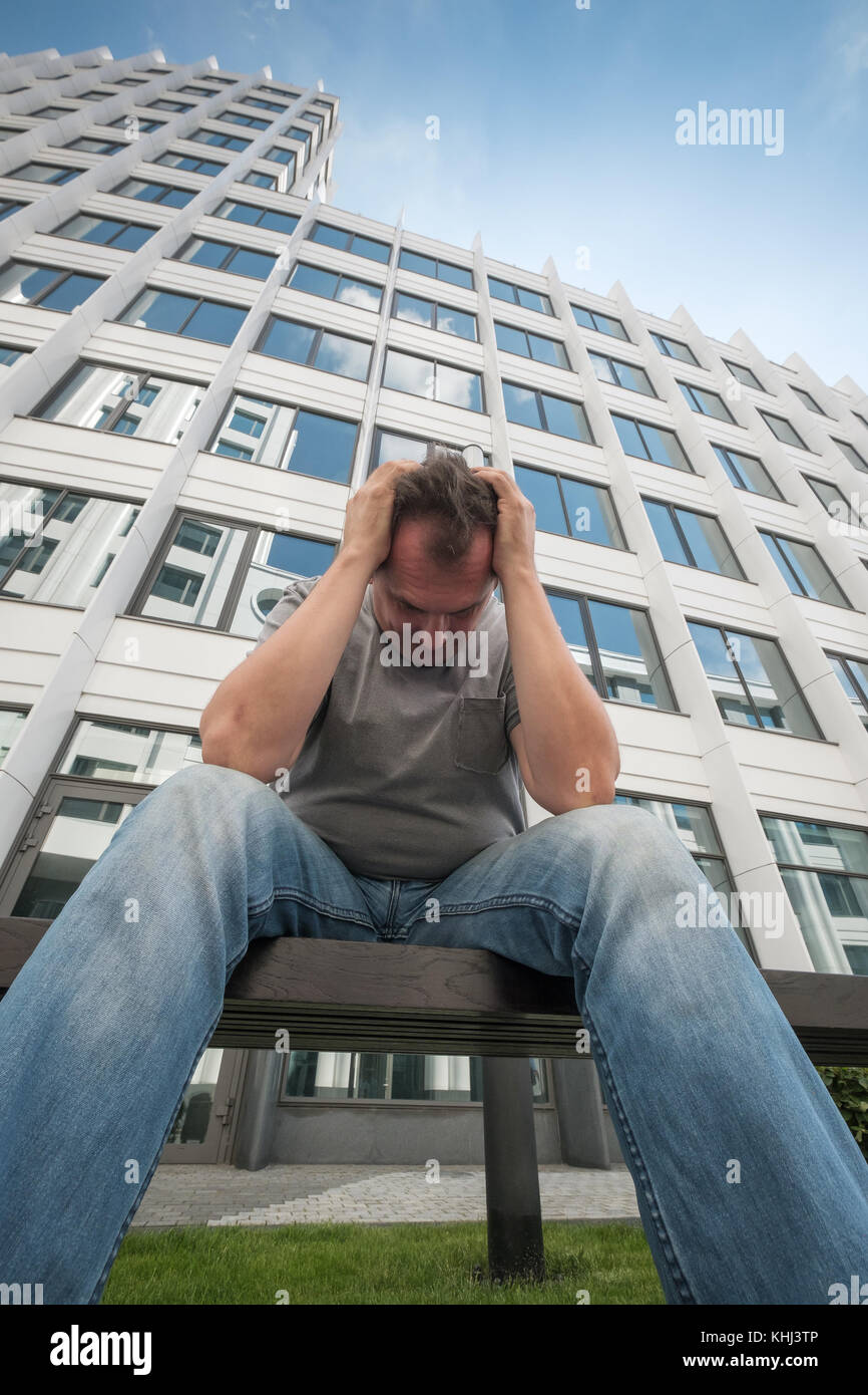 Sad middle age man portrait Stock Photo - Alamy