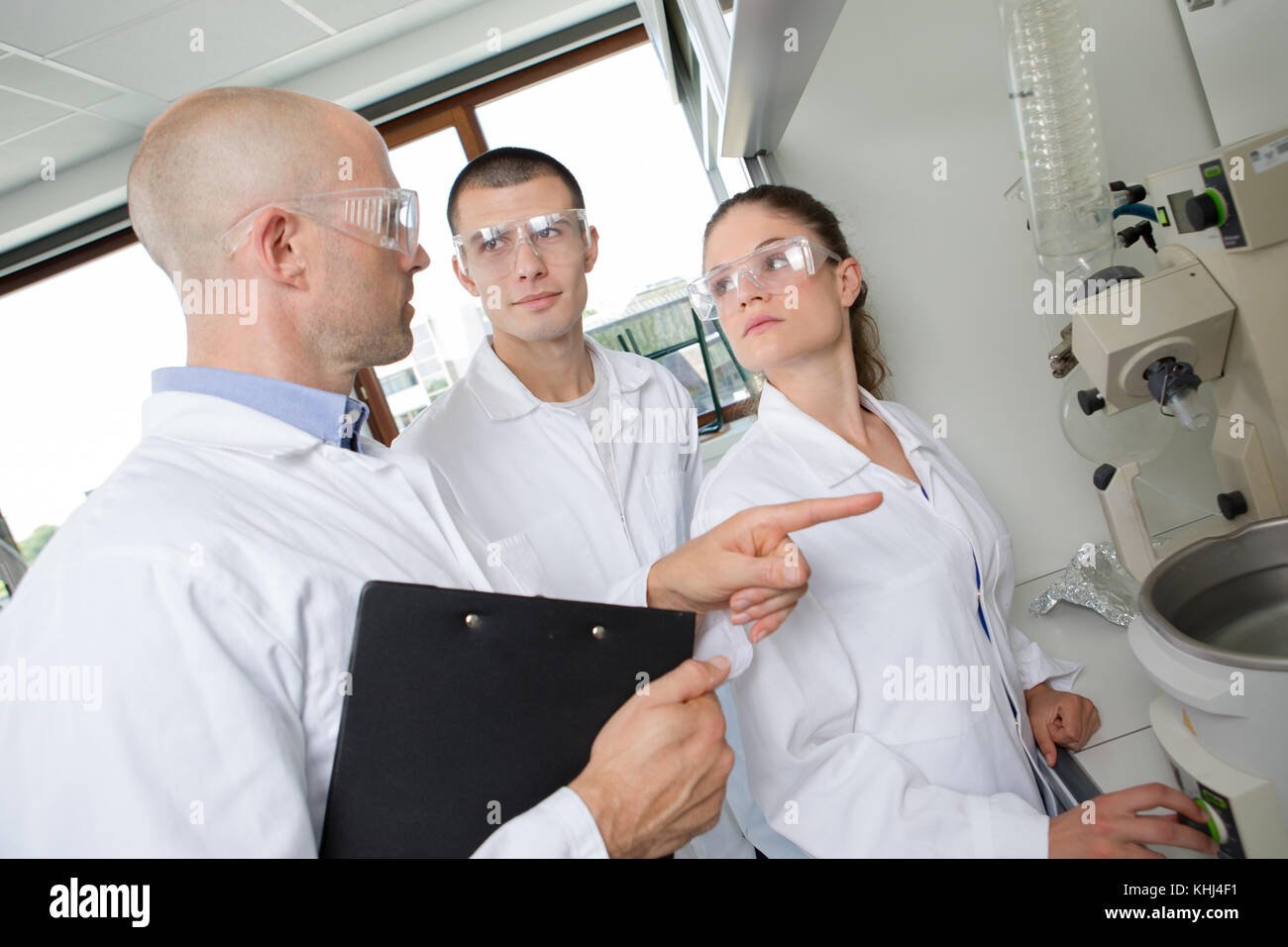 two students performing an experiment Stock Photo - Alamy
