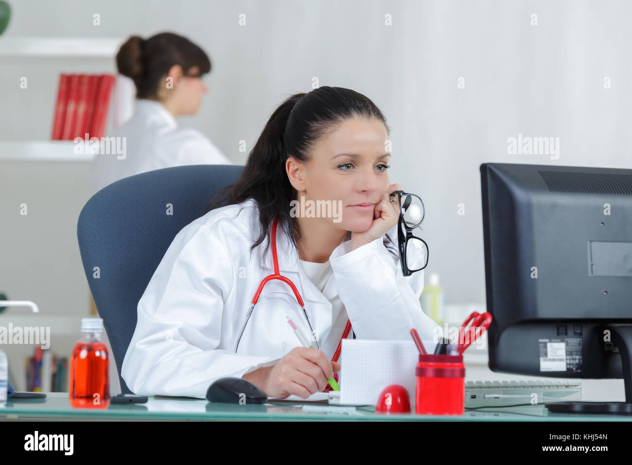 doctor and medical assistant Stock Photo - Alamy
