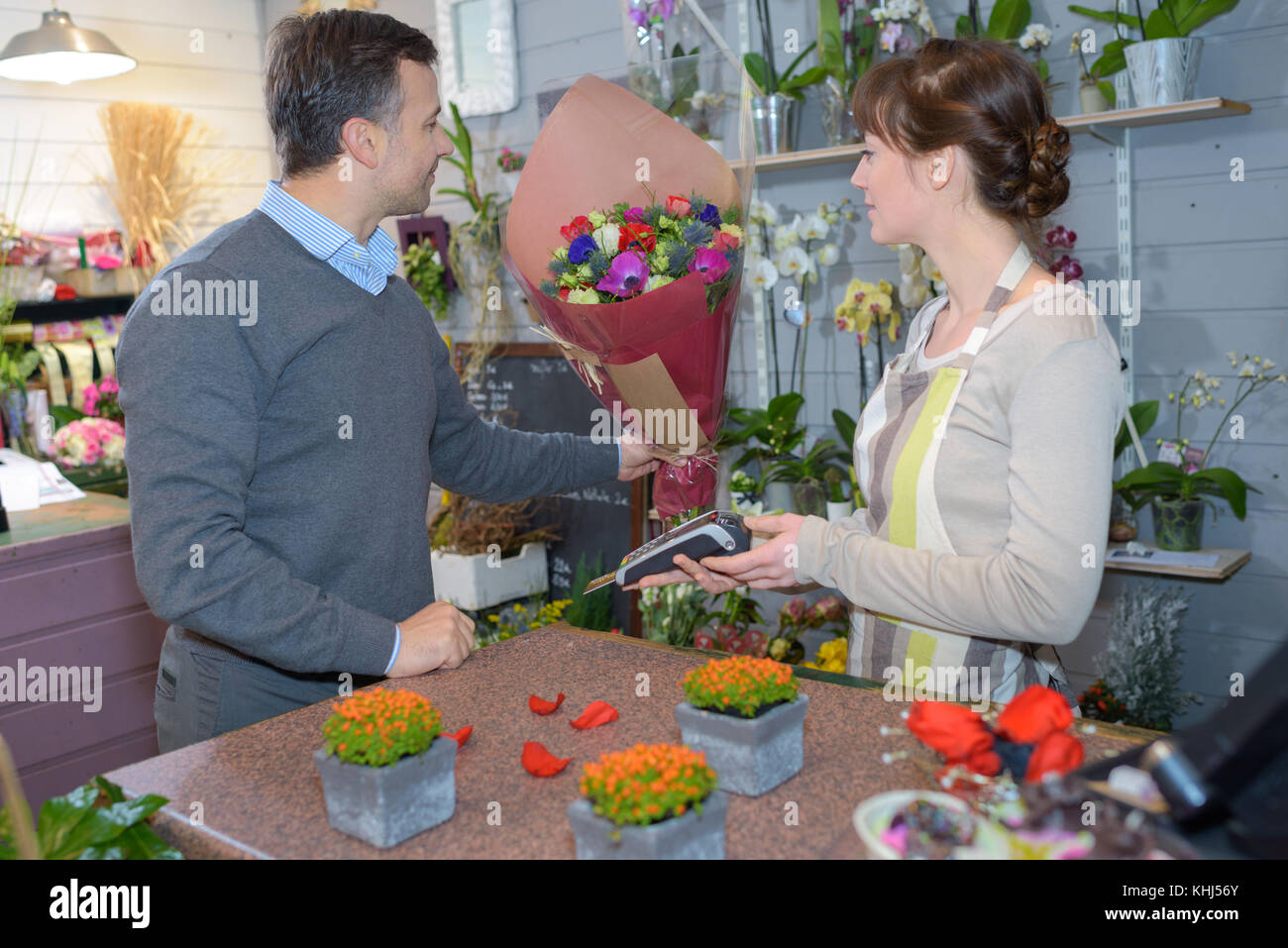 florists and man in the shop Stock Photo - Alamy