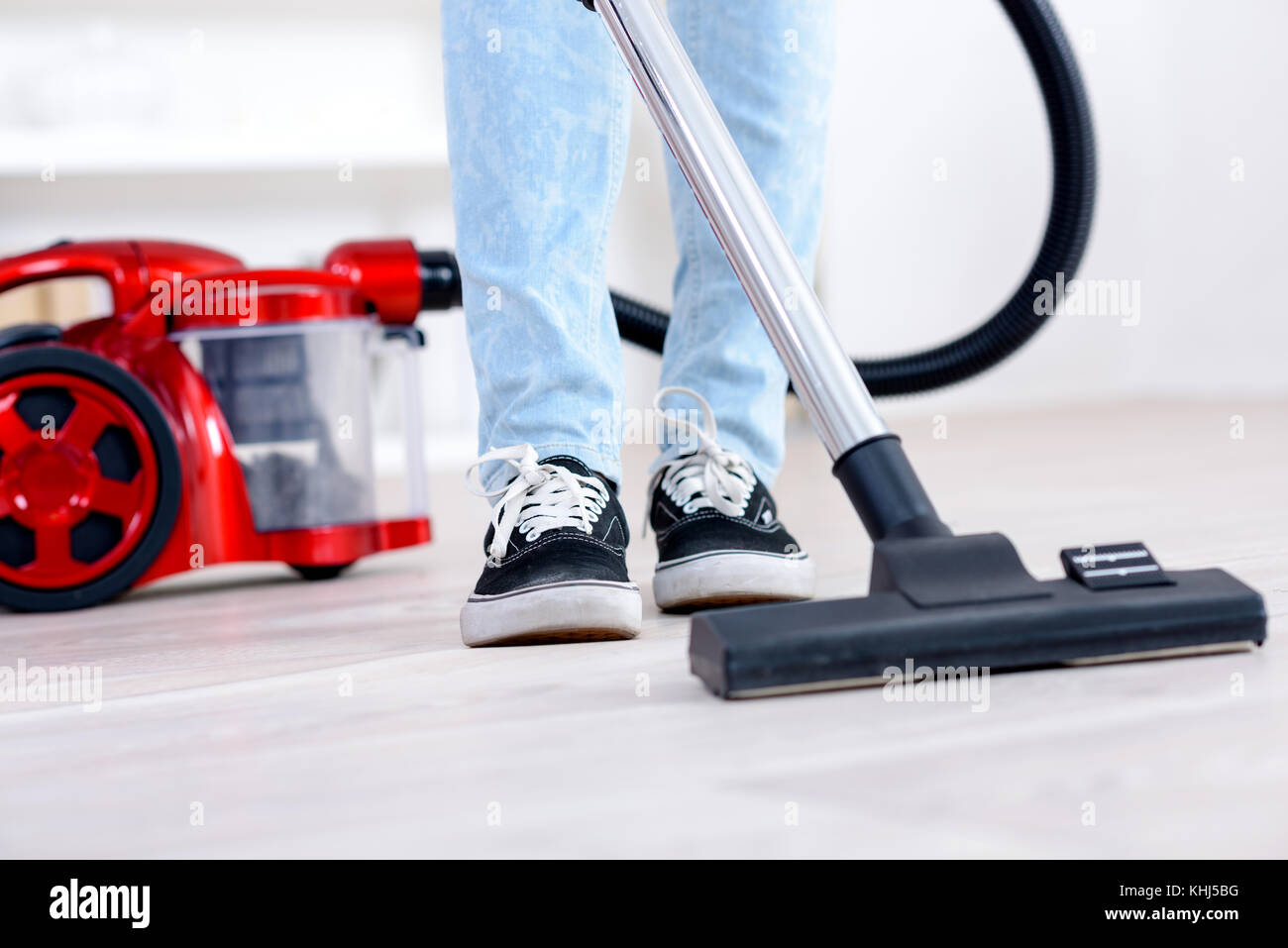 vacuum cleaning the floor Stock Photo - Alamy