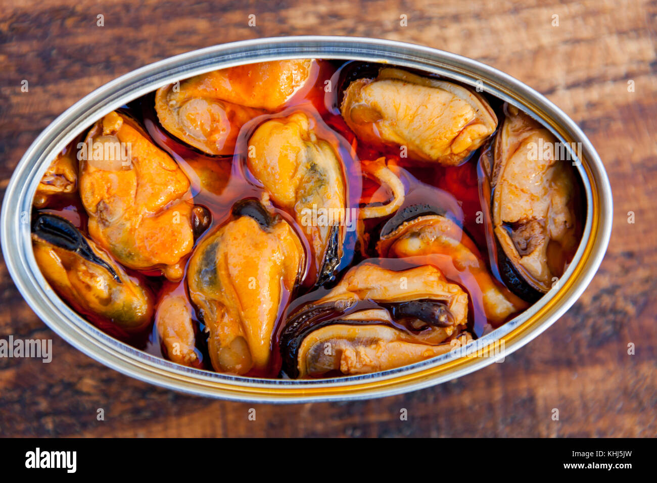 Canister of canned mussels. Healthy meal Stock Photo - Alamy