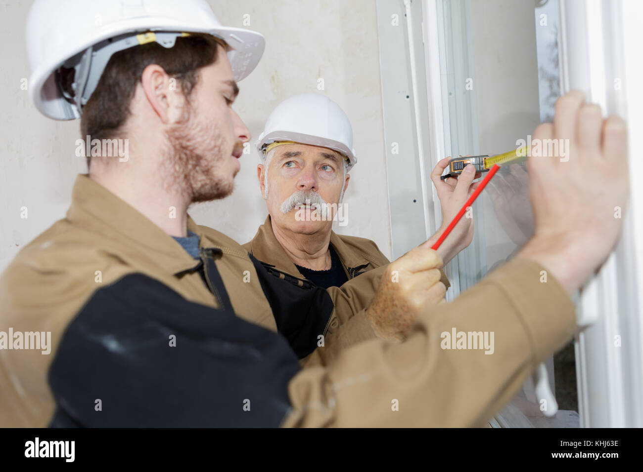 window installer team Stock Photo - Alamy