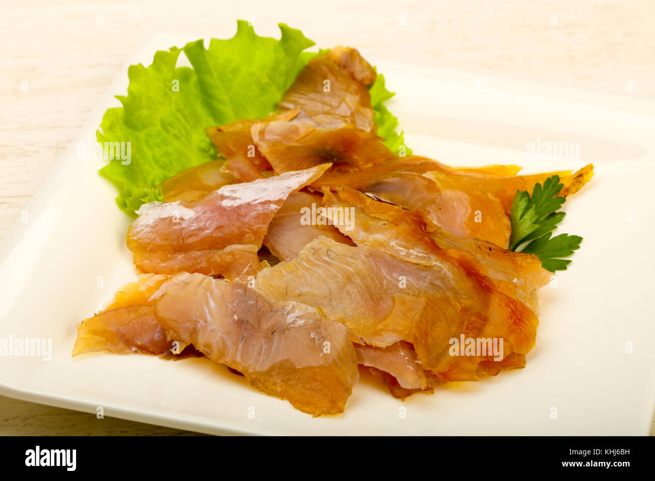 Smoked catfish fillet carpaccio Stock Photo - Alamy