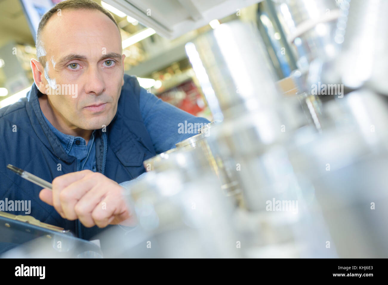 factory manager inspecting high tech line Stock Photo - Alamy