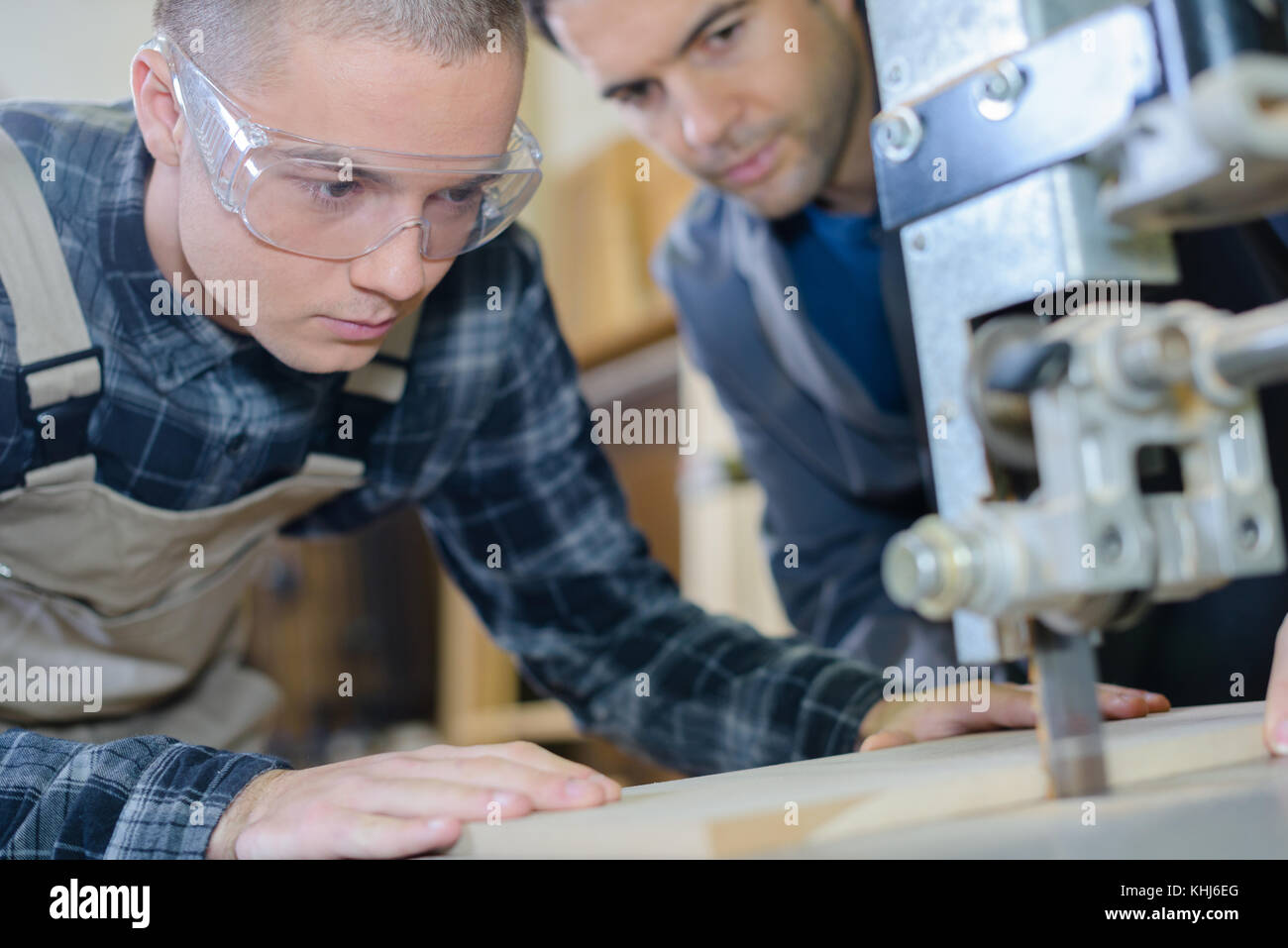 male engineer in factory using milling machine Stock Photo - Alamy