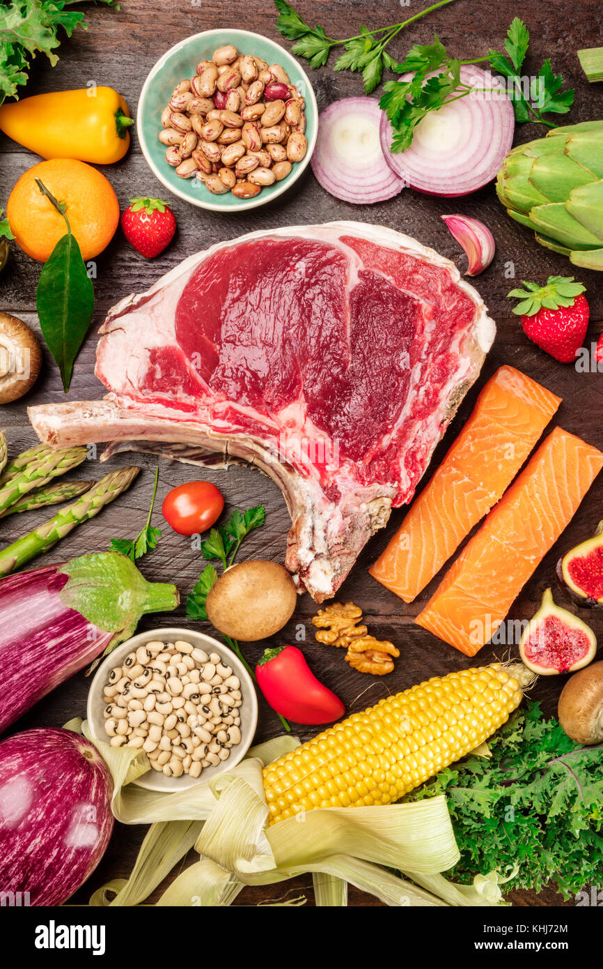 Overhead photo of many fresh food products on rustic tetxure Stock ...