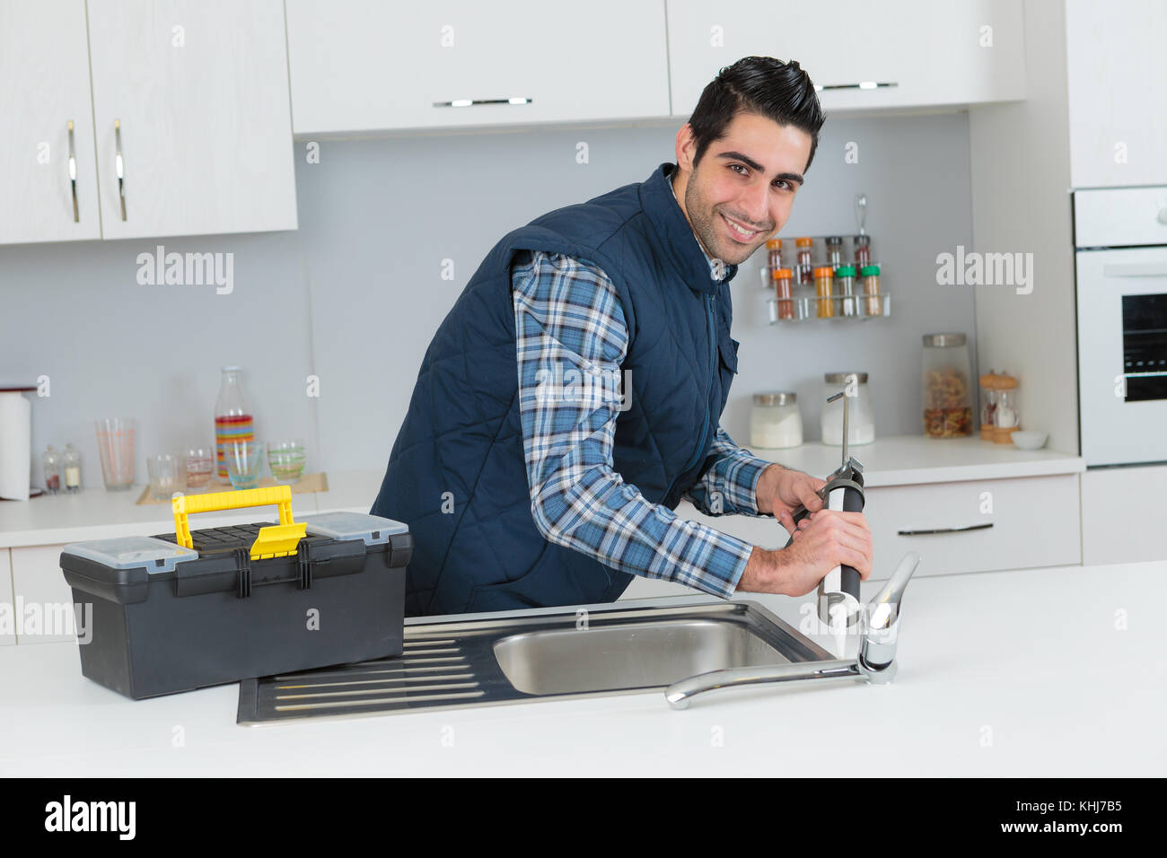 the happy plumber Stock Photo - Alamy