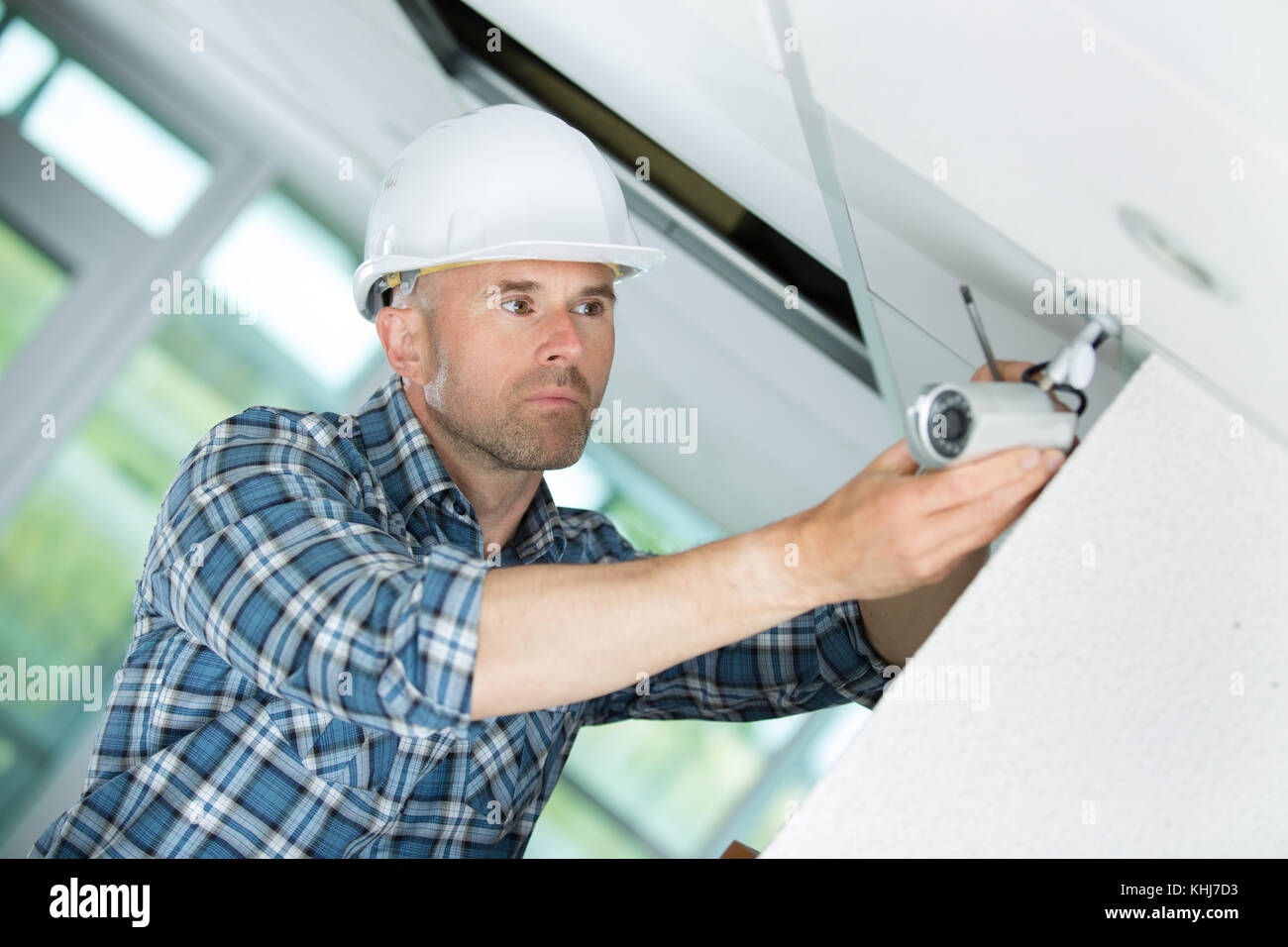 installing cameras in the building Stock Photo - Alamy