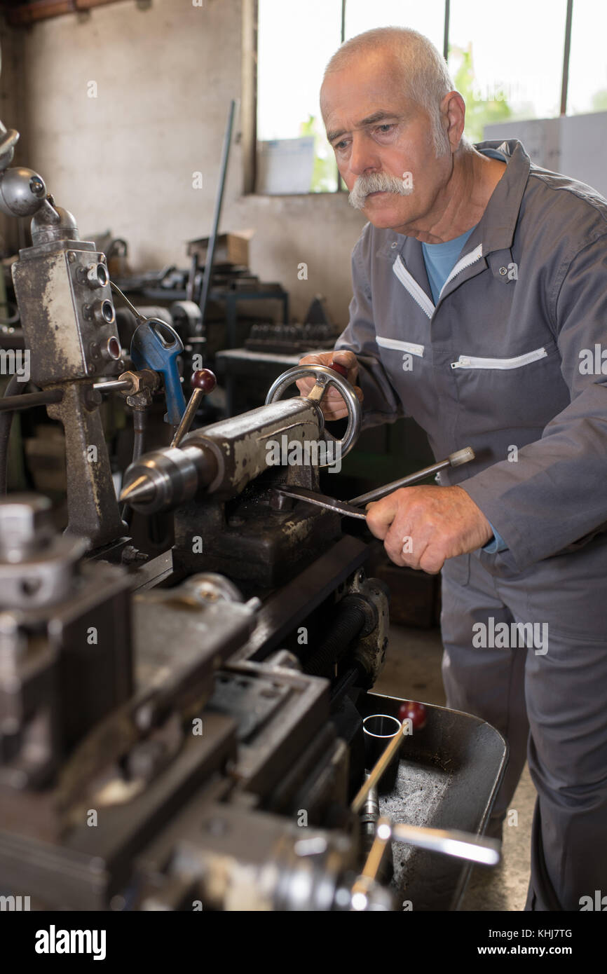 senior worker at a factory Stock Photo - Alamy