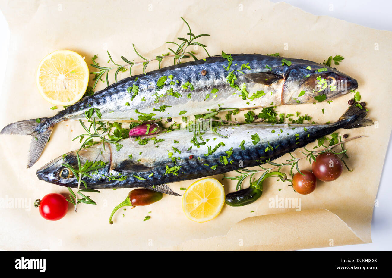 Mackerel fish with cooking ingredients on baking paper Stock Photo - Alamy