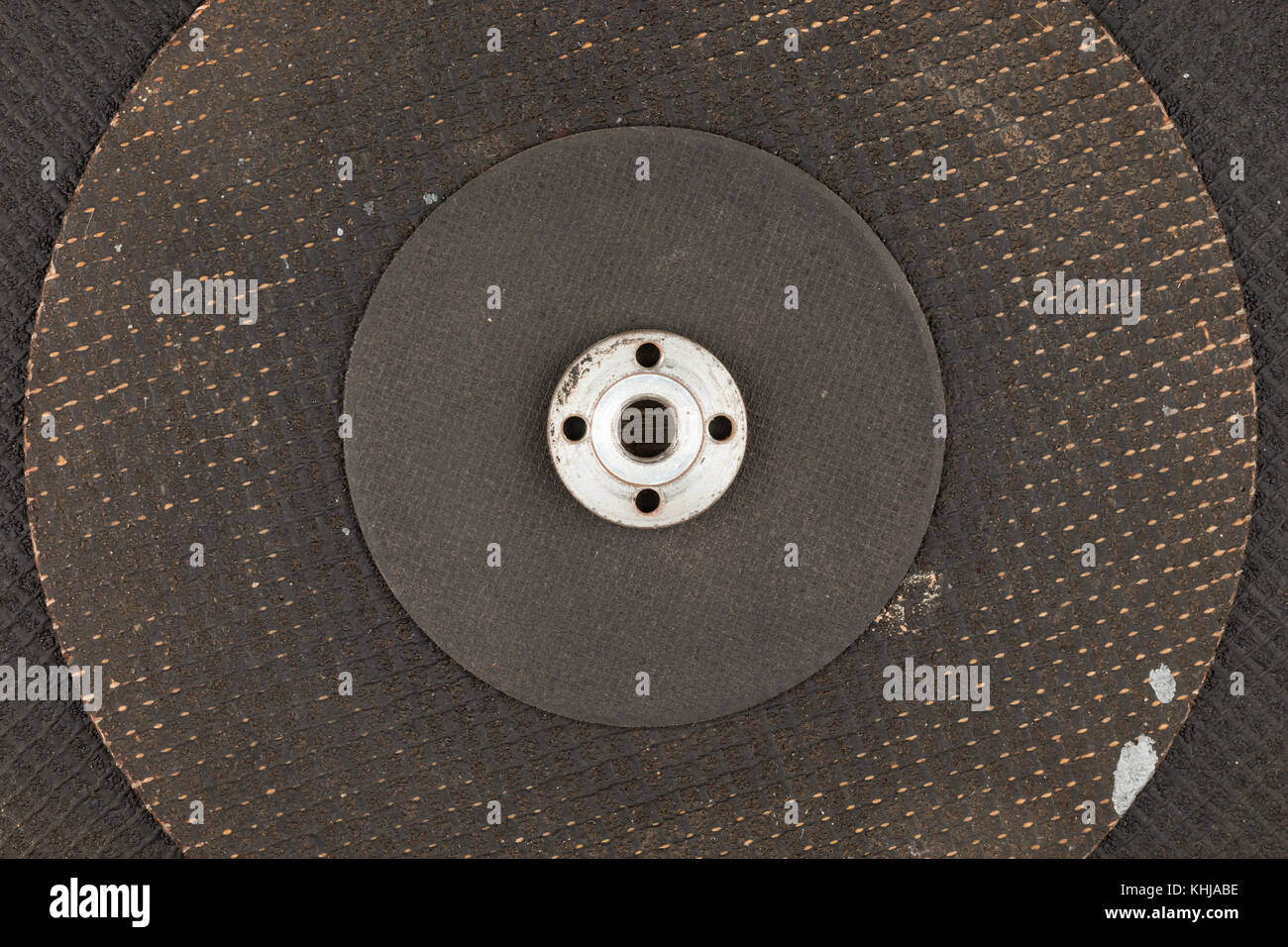 Texture of three cutting discs over metal lying on top of each other ...