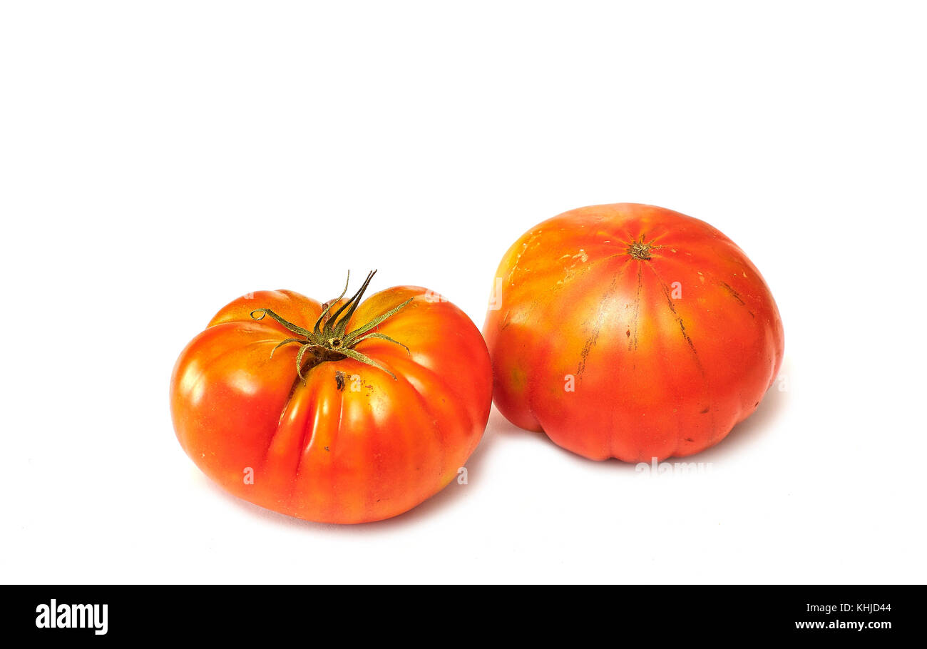 A pair of Raf tomatoes isolated on white Stock Photo - Alamy