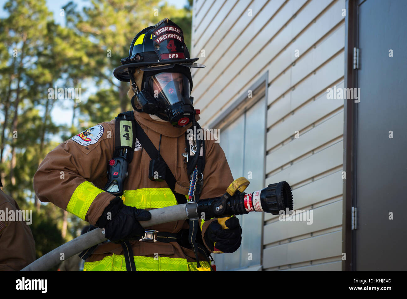 Firefighters Battle a Simulated Fire Stock Photo - Alamy