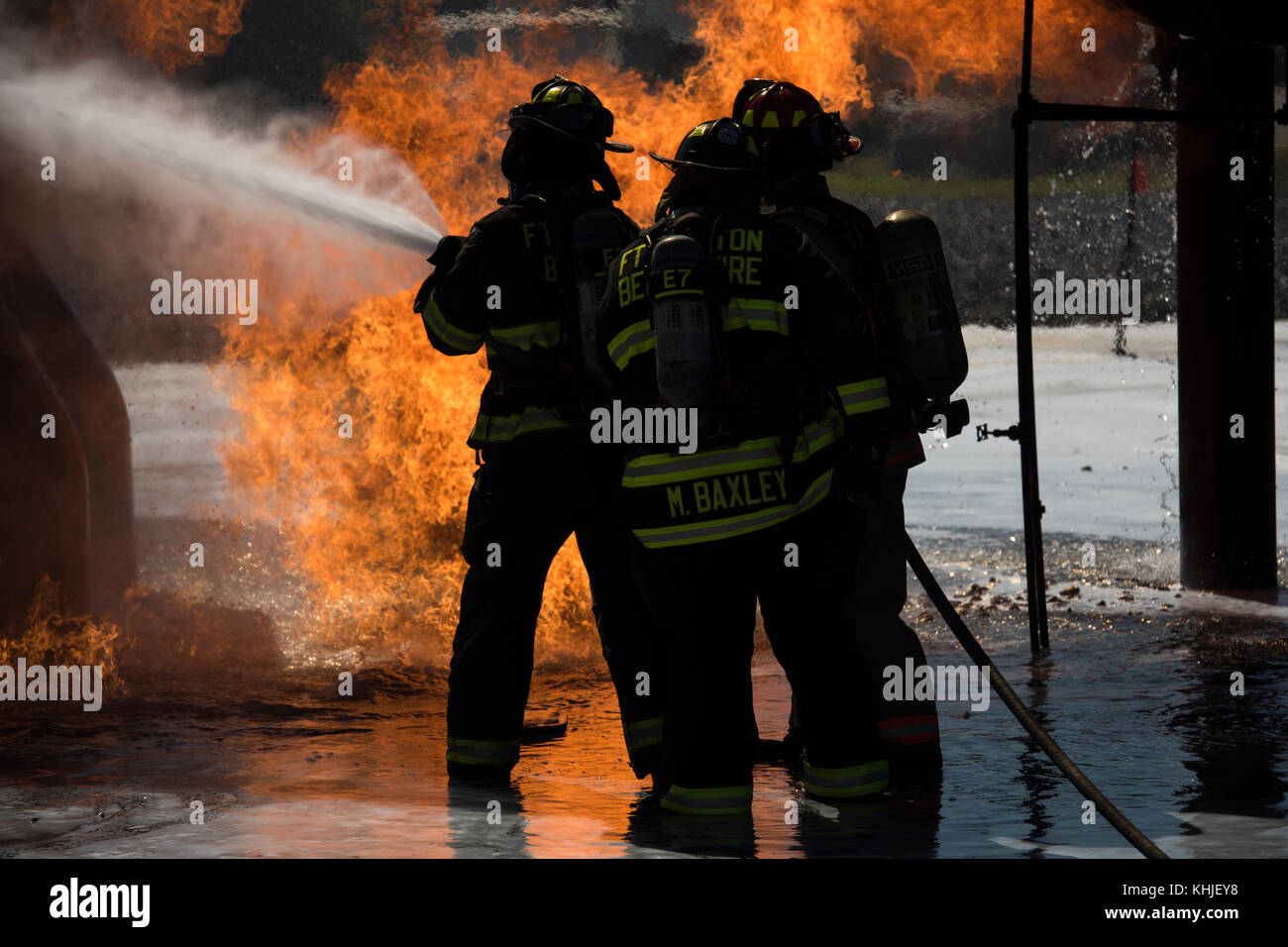 Firefighters Battle a Simulated Fire Stock Photo - Alamy