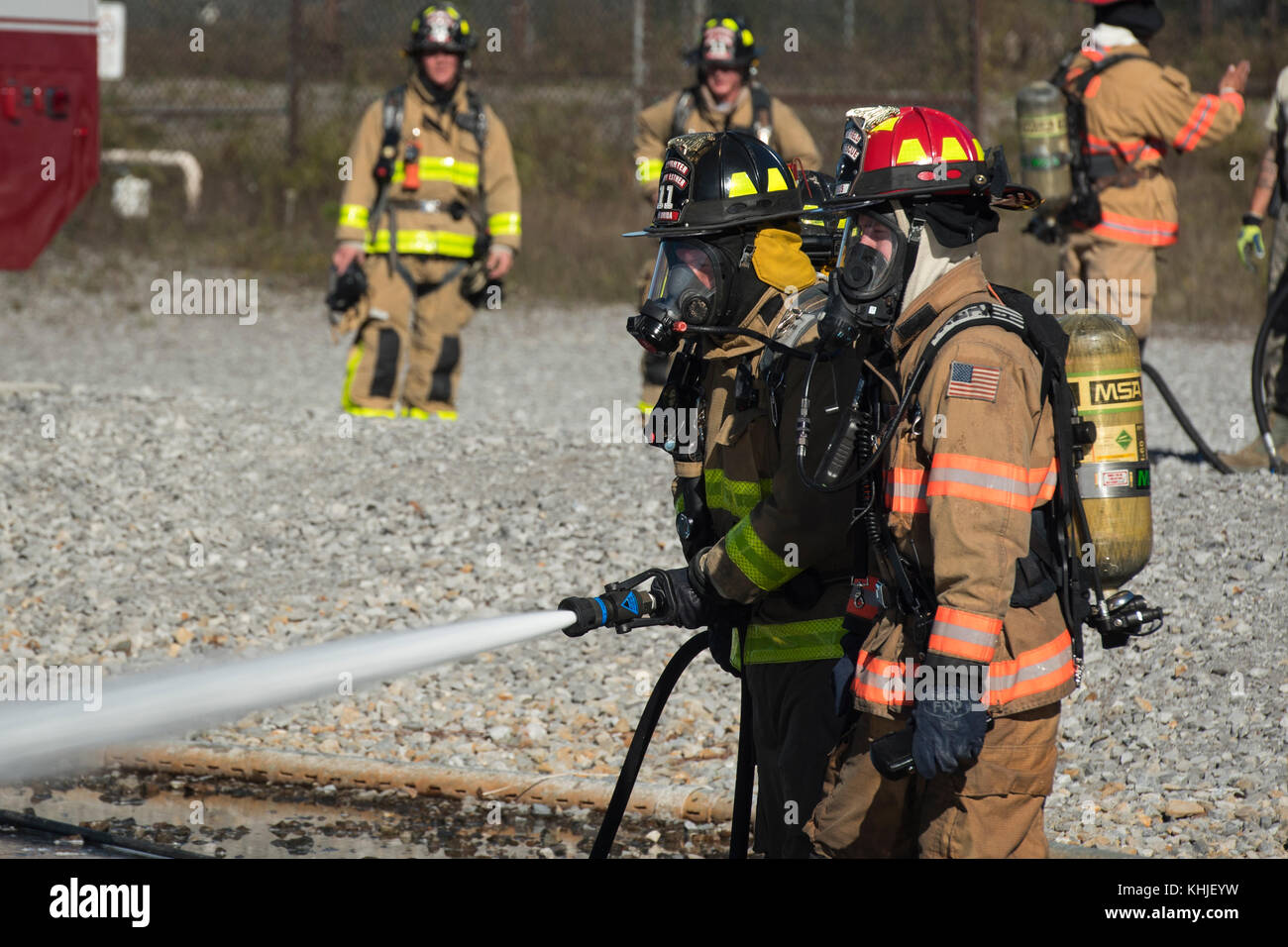 Firefighters Battle a Simulated Fire Stock Photo - Alamy